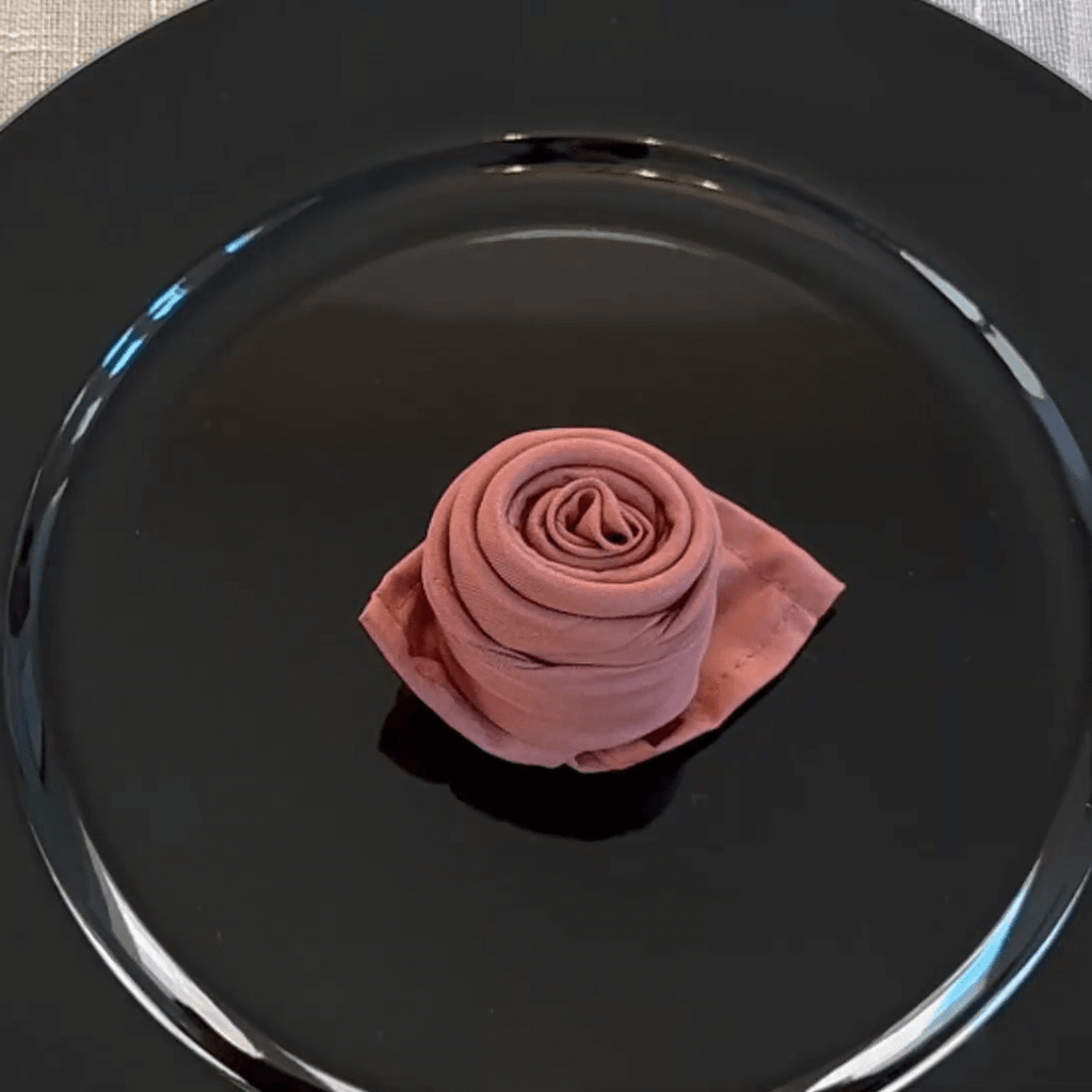 How to Fold a Cloth Napkin into a Rose | TableclothsFactory