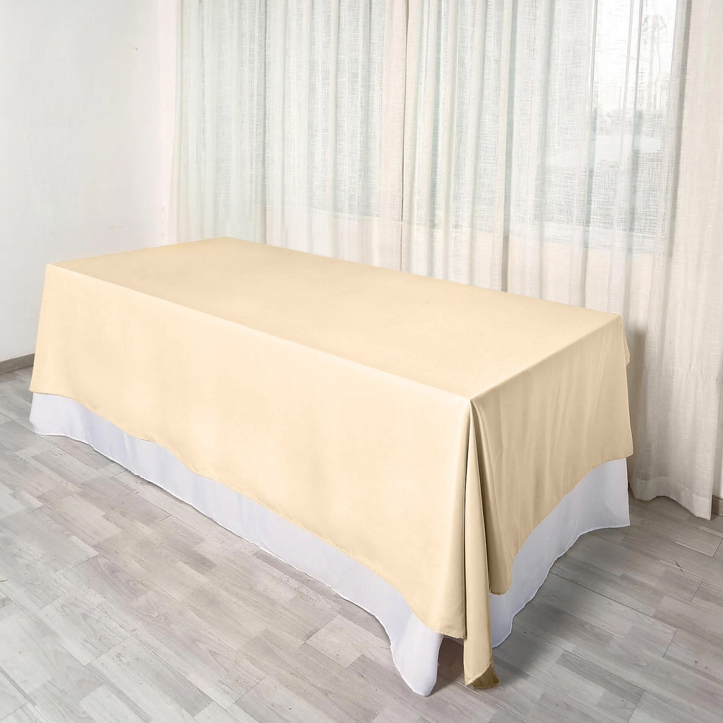 Polyester Tablecloth 90"x132" Beige by TableclothsFactory.com