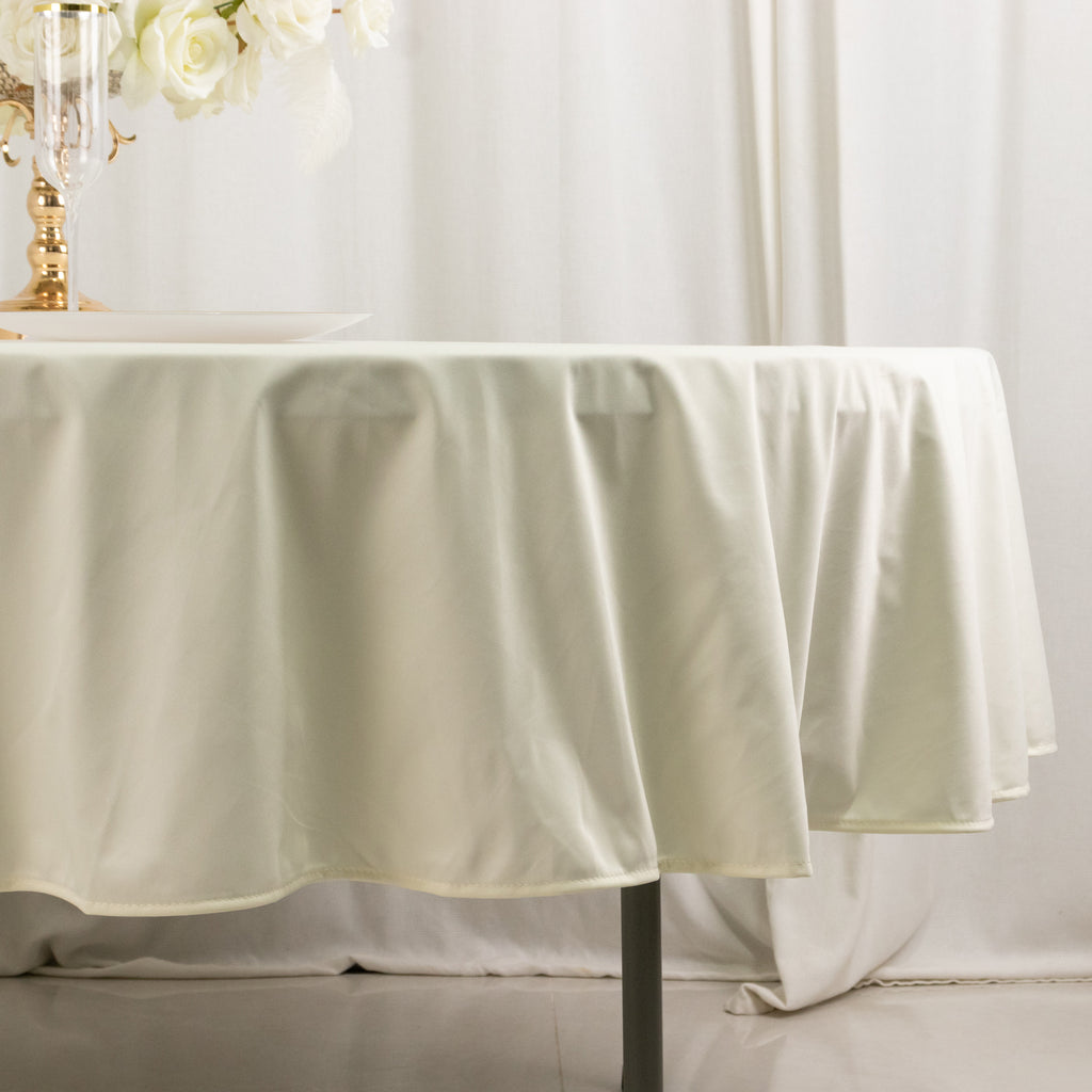Premium Scuba Round Tablecloth 90" Ivory by TableclothsFactory.com