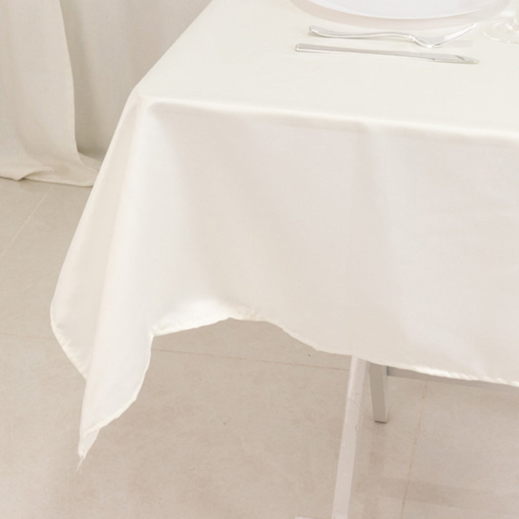 Lamour Satin Square Overlay 54"x54" Ivory | TableclothsFactory