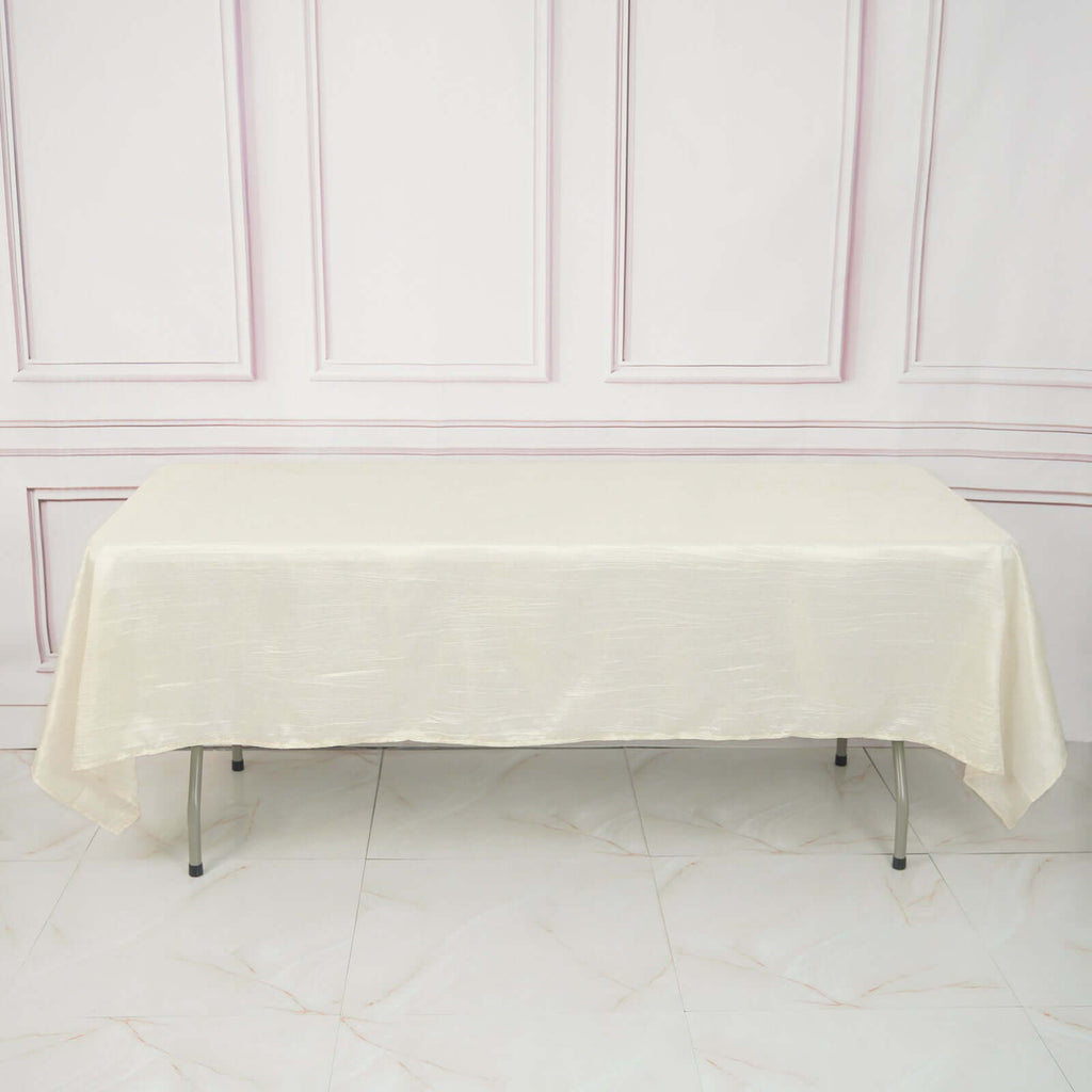 Accordion Crinkle Tablecloth 60"x102" Ivory | TableclothsFactory