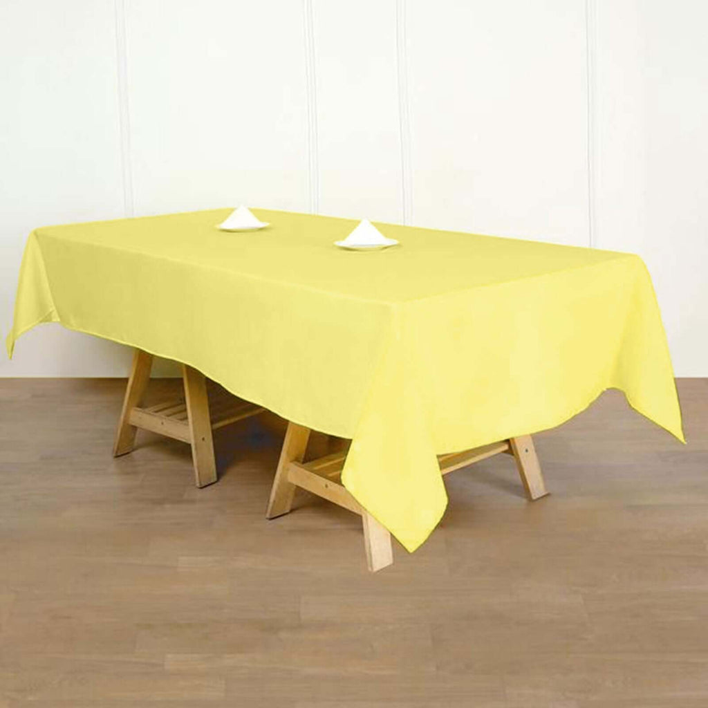 Polyester Tablecloth 60"x102" Yellow | TableclothsFactory