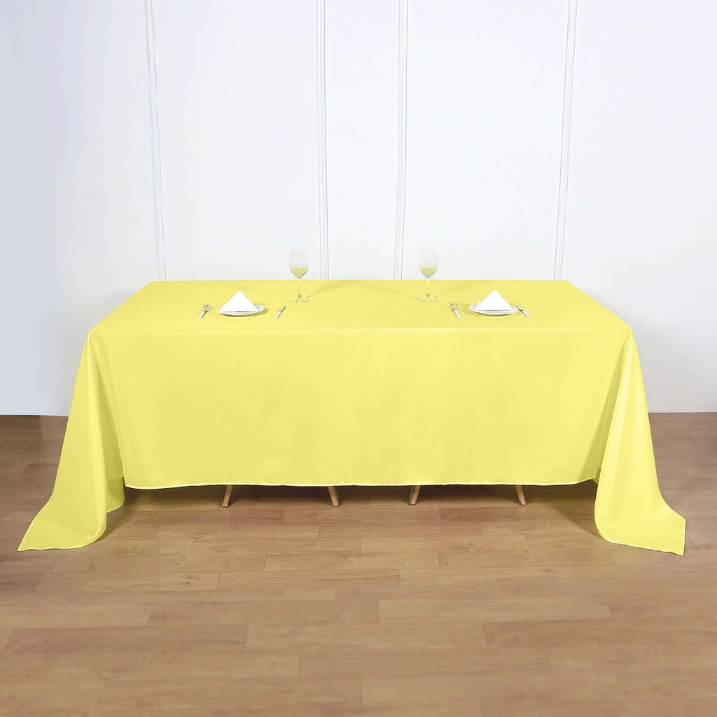 Polyester Tablecloth 90"x132" Yellow | TableclothsFactory