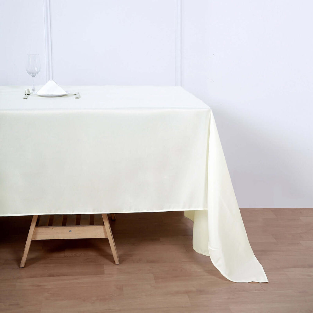 Polyester Tablecloth 60"x126" Ivory | TableclothsFactory