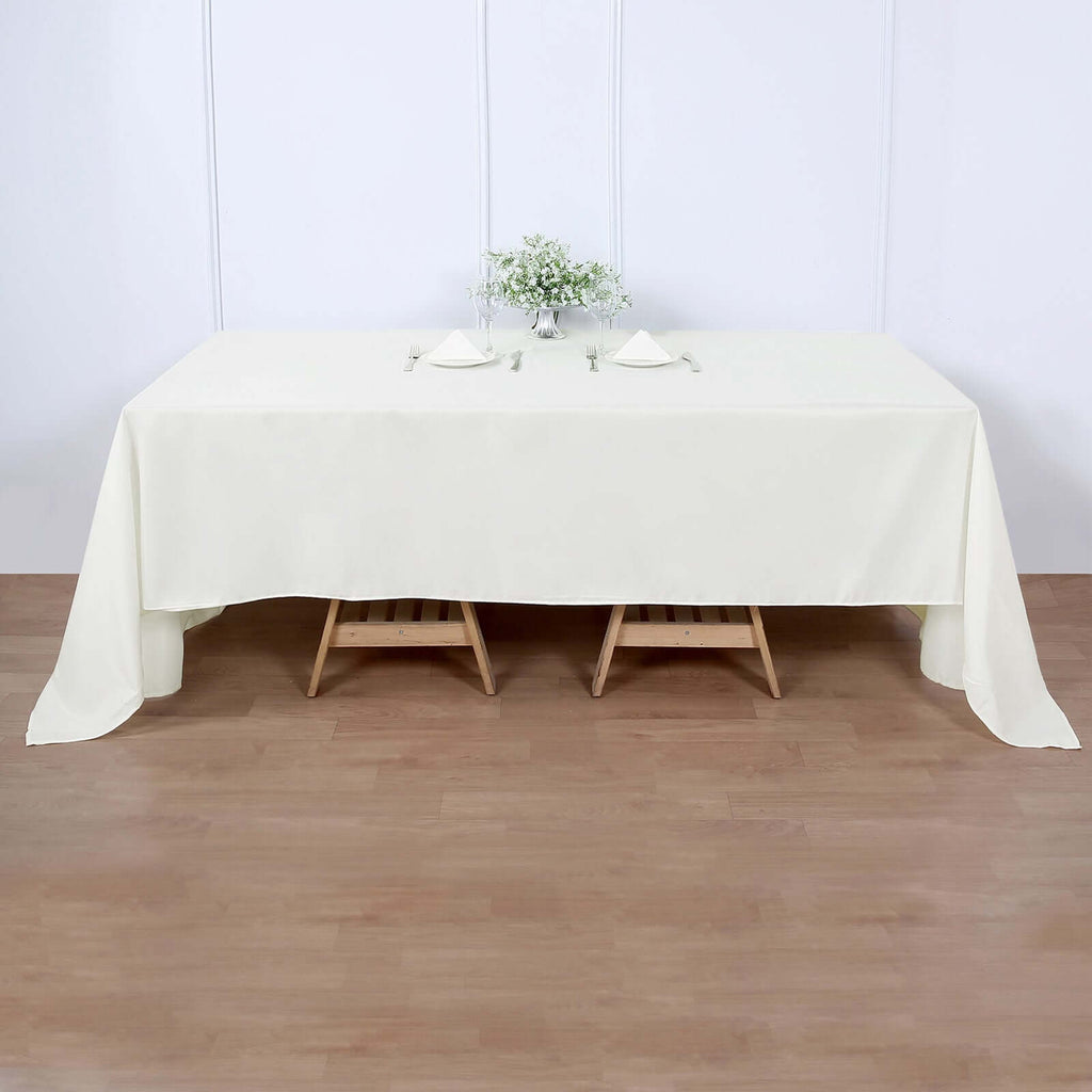 Polyester Tablecloth 60"x126" Ivory | TableclothsFactory