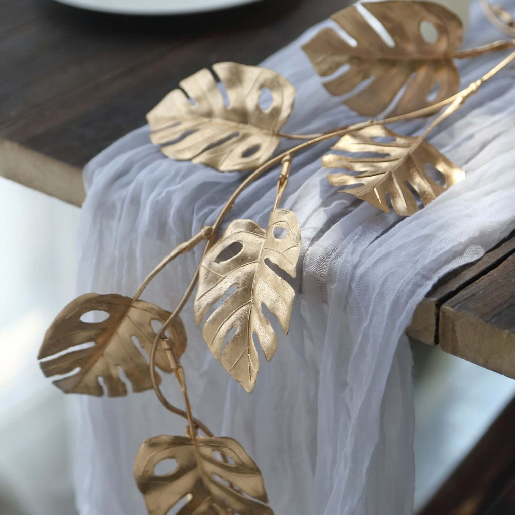 Artificial Metallic Gold Monstera Leaf Garland | TableclothsFactory