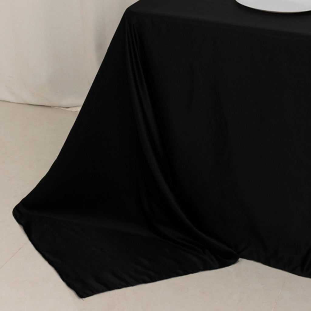 Lamour Satin Tablecloth 90"x132" Black | TableclothsFactory