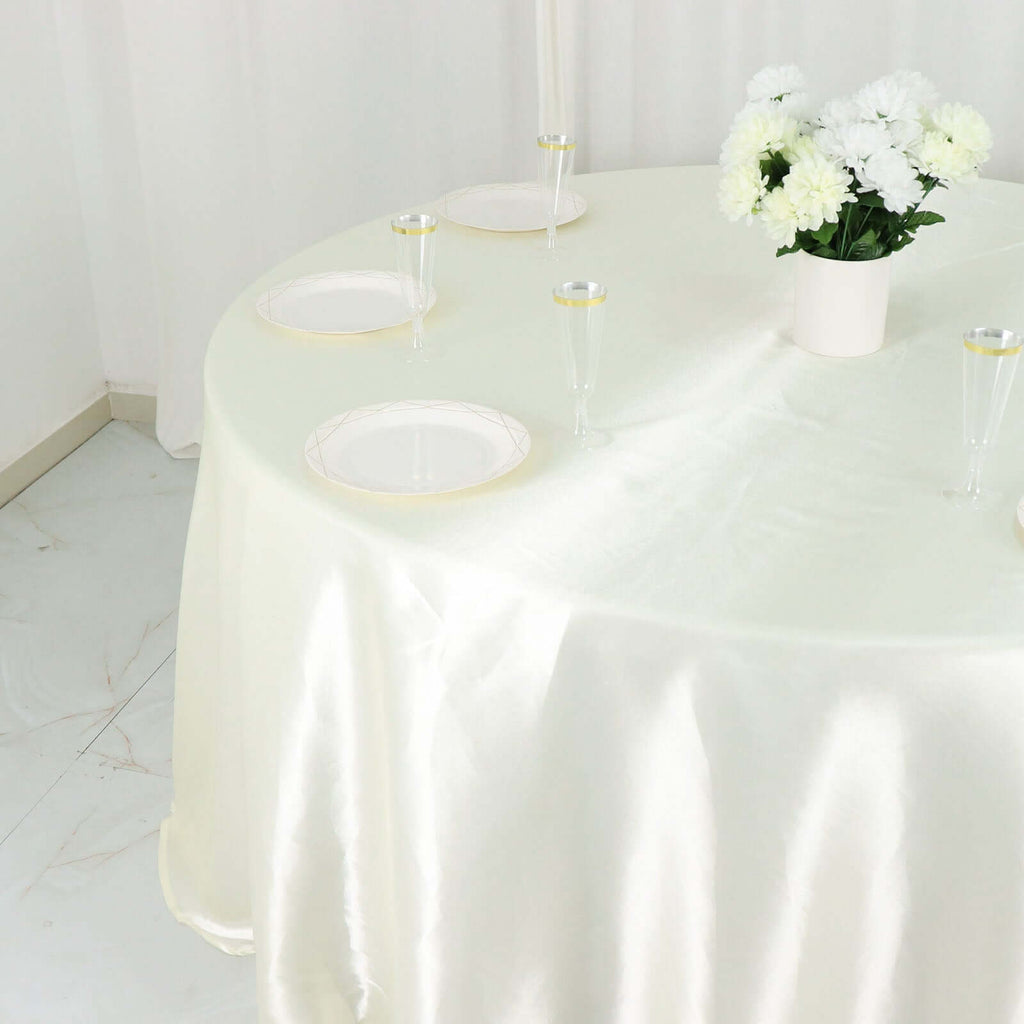 Satin Round Tablecloth 132" Ivory | TableclothsFactory