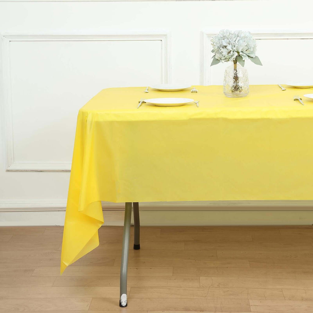 Plastic Rectangle Table Covers 54"x108" Yellow | TableclothsFactory