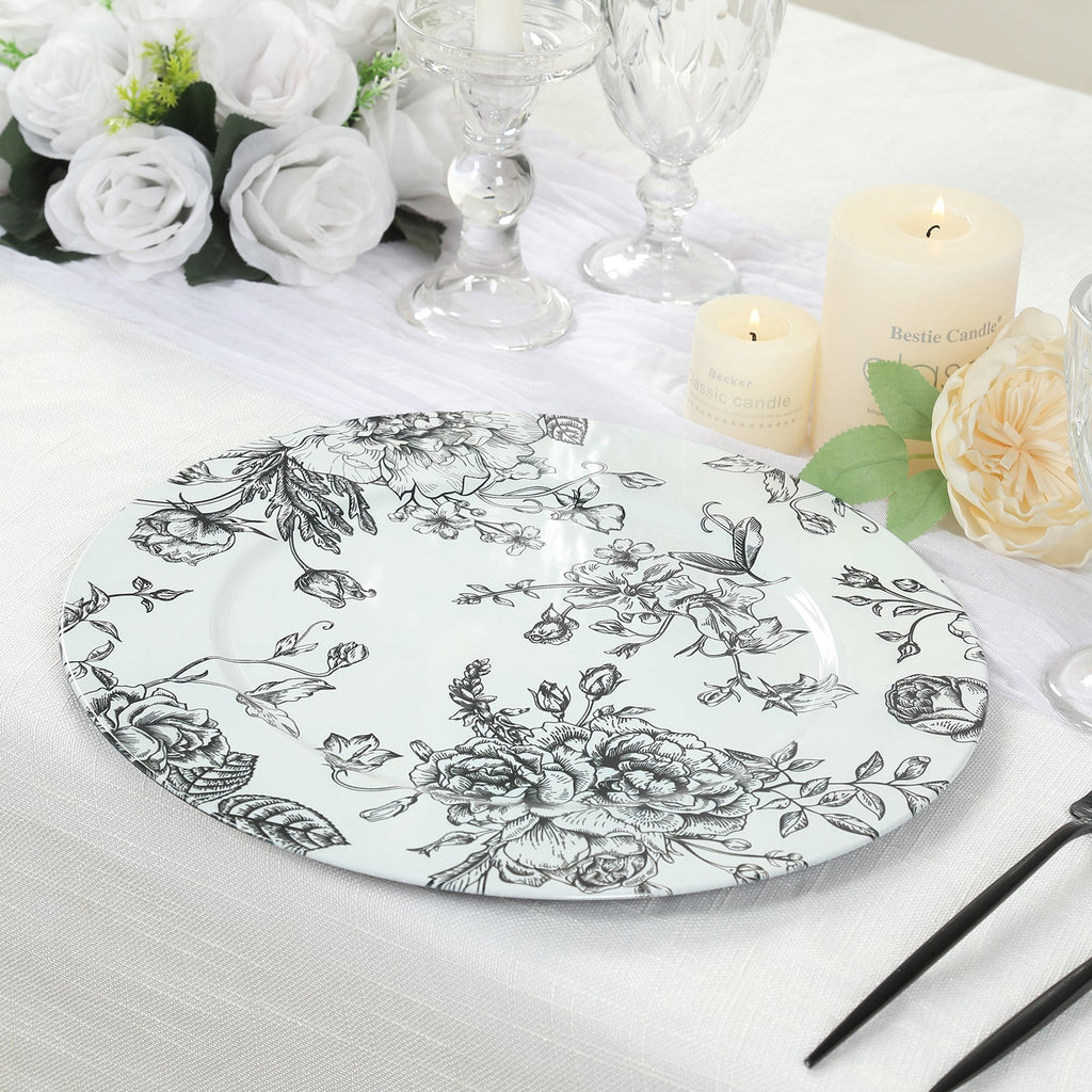 White & Black Floral Acrylic Chargers | TableclothsFactory