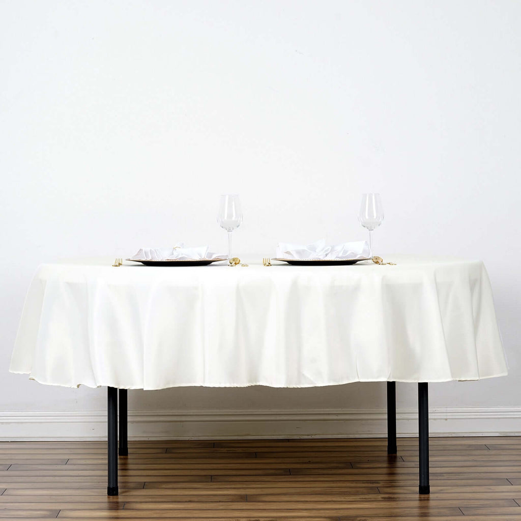 Polyester Round Tablecloth 90" Ivory by TableclothsFactory.com