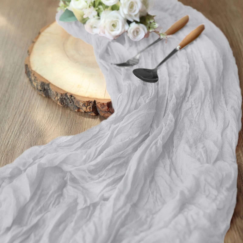 Cheesecloth Boho Table Runner 10ft Ivory by TableclothsFactory.com