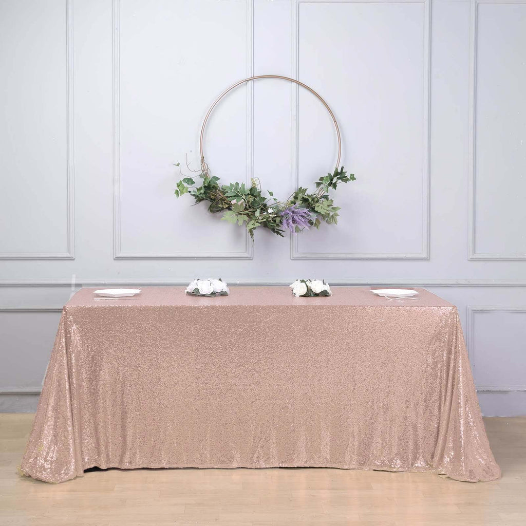 Sequin Tablecloth 90"x156" Rose Gold by TableclothsFactory.com