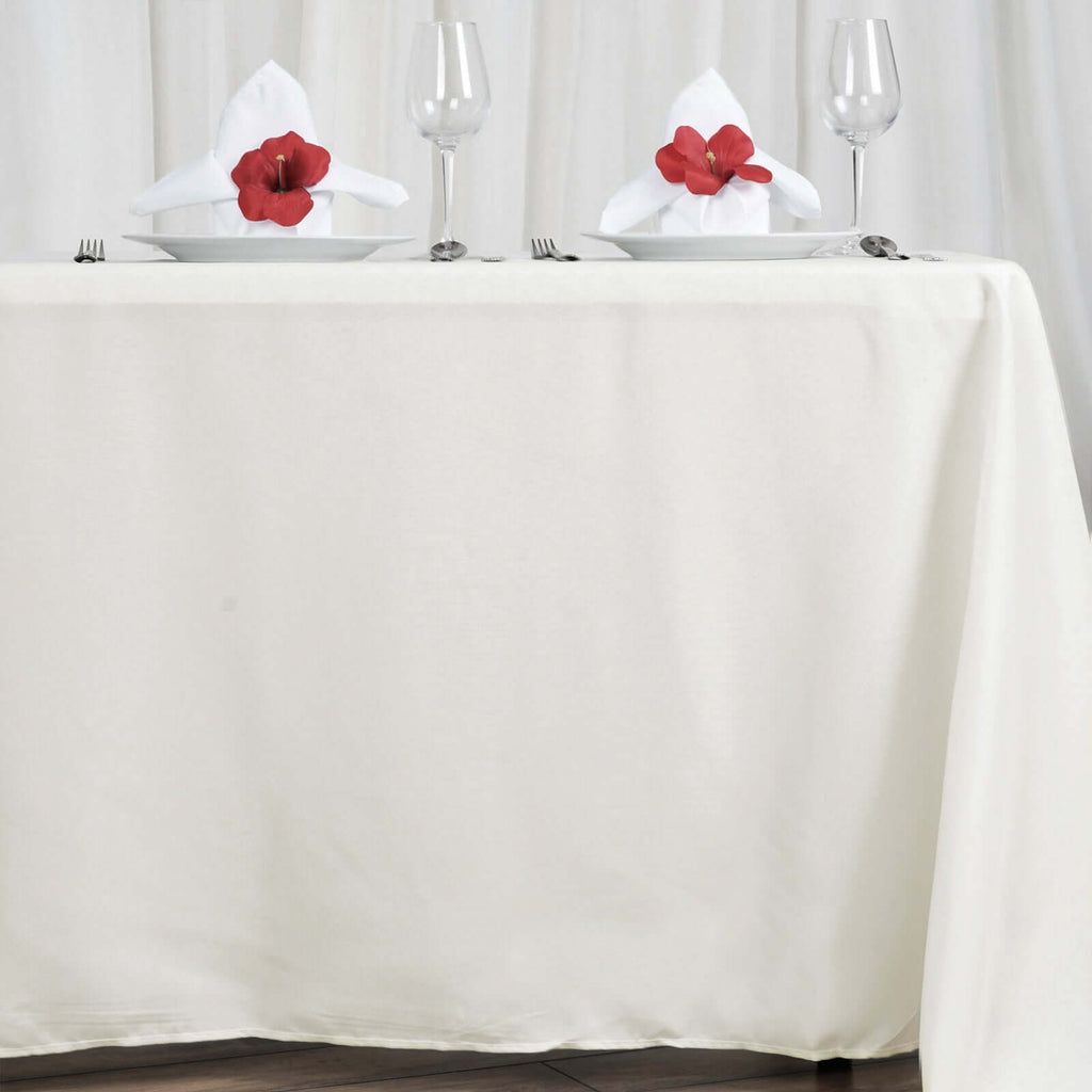 Polyester Tablecloth 72"x120" Ivory by TableclothsFactory.com